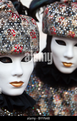 Italy, Venice, typical carnival masks in Piazza San Marco Stock Photo ...