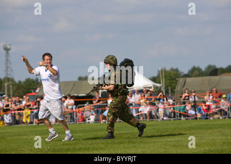 RAF police dogs demonstration of crowd control Stock Photo - Alamy
