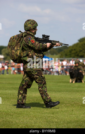 RAF police dogs demonstration of crowd control Stock Photo - Alamy