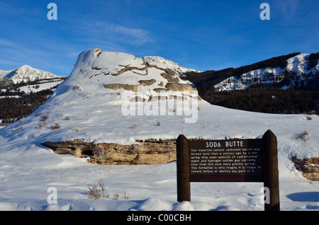 A travertine mount called Soda Butte covered in snow. Lamar Valley ...