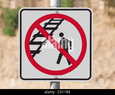 Rail safety sign, do not cross train lines Stock Photo - Alamy