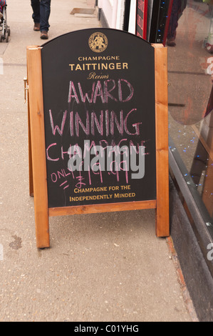 Signs outside off-license shop, England UK Stock Photo: 111656562 - Alamy