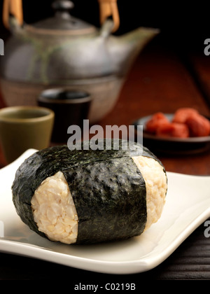 Rice ball wrapped in nori seaweed Stock Photo - Alamy