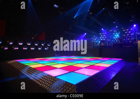 An empty dance floor with illuminated disco squares. ready for a dance ...