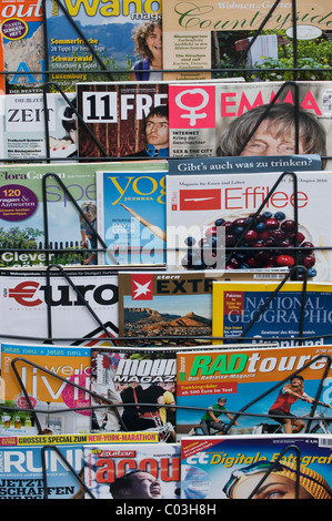 German magazines for sale on a magazine rack Stock Photo - Alamy