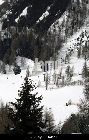 Cable Car traversing the valley at Colfosco in the valley between Selva ...