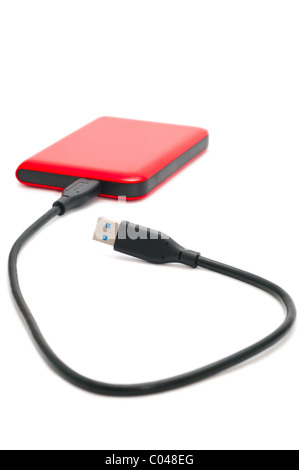 Red external hard disk isolated on white background Stock Photo - Alamy