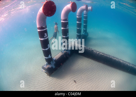Brine discharge pipe and vent from a desalination plant Stock Photo ...