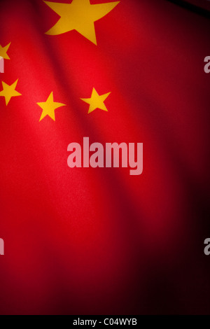 waving china flag red background and yellow stars Stock Photo - Alamy