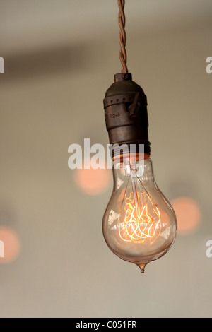 Lighting decor. Retro light bulb filament close up.Illuminated Stock ...