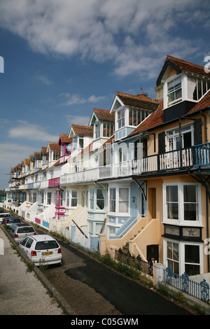 A row of colourful sea front properties on Marine terrace Whitstable ...