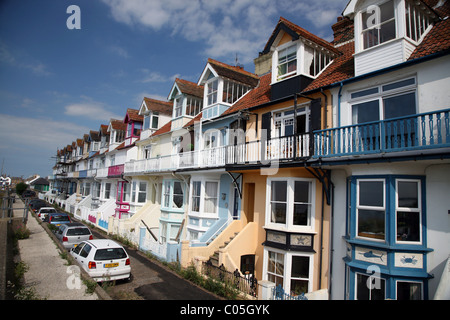 A row of colourful sea front properties on Marine terrace Whitstable ...