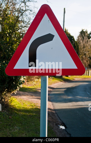 Traffic code with traffic sign danger point on a road, red exclamation ...