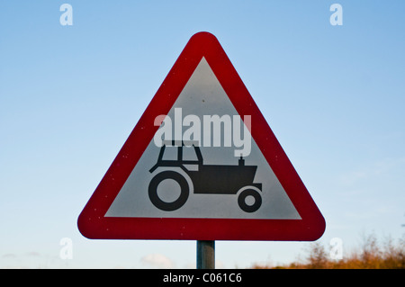 Warning sign with farm tractor symbol Stock Photo - Alamy