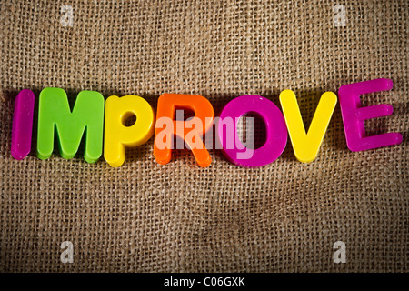 Improve Dictionary Definition Low key close up Stock Photo - Alamy