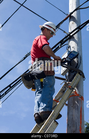 Telephone lineman repairs DSL line Stock Photo - Alamy
