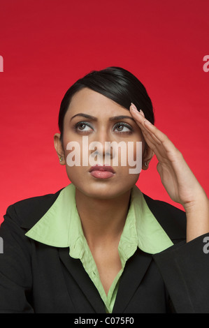 Woman in suit suffering from menstrual pain at workplace, closeup Stock ...
