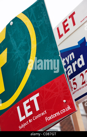 Foxtons real estate sign To Let outside terraced houses in South London ...