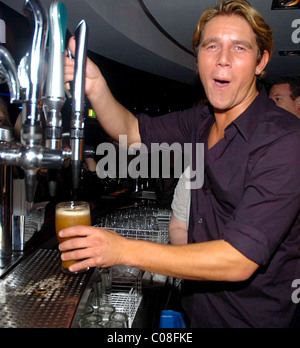 Ziggy aka Zach Lichman serving behind the bar at Earth nightclub in ...