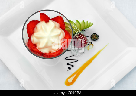 Dessert, Baileys mousse with raspberry sorbet garnished with strawberry ...