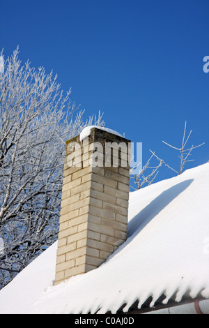 Smokestack in snow Stock Photo - Alamy