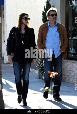 Greg Proops walks with his wife Jennifer Canaga after having lunch ...