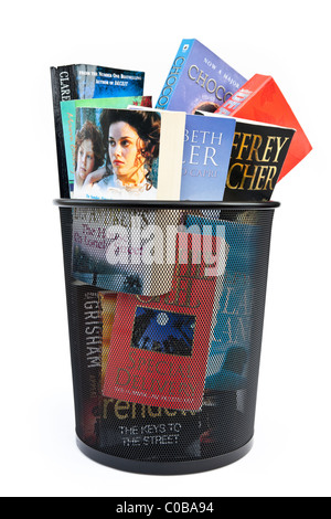 Books thrown away in a waste paper basket. Demise of printed word ...