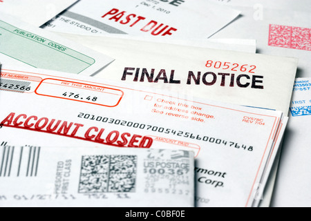 still life of overdue bills with "final Notice", "past due" and ...