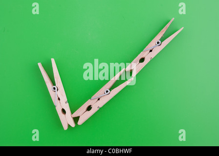 Acceptance sign made of wooden clothes pegs on a green background Stock ...
