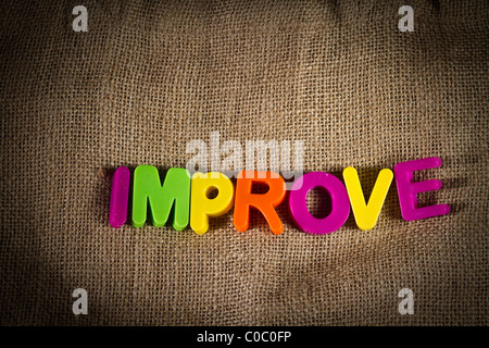 Improve Dictionary Definition Low key close up Stock Photo - Alamy