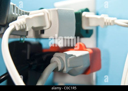Overloaded Electrical Outlet Stock Photo - Alamy