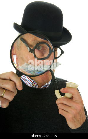 Portrait of a funny inspector with a big magnifier for investigation ...