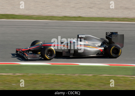 Hispania Racing Team driver Narain Karthikeyan of India takes a corner ...