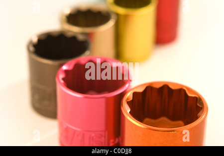 Colored coded metal sockets from a socket wrench set Stock Photo - Alamy