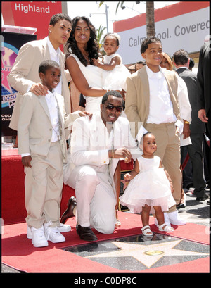 Sean Combs aka P Diddy and Kim Porter leaving a party thrown by the Beckhams at Via Veneto ...