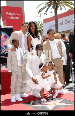 Sean Combs aka P Diddy and Kim Porter leaving a party thrown by the Beckhams at Via Veneto ...