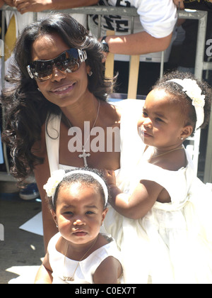 Sean Combs aka P Diddy and Kim Porter leaving a party thrown by the Beckhams at Via Veneto ...