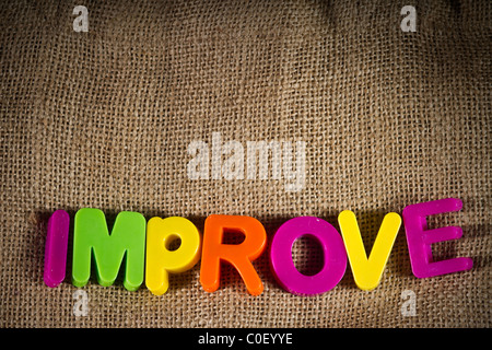 Improve Dictionary Definition Low key close up Stock Photo - Alamy