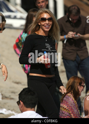 Linda Thompson having fun at a beach party in Malibu Malibu, California ...