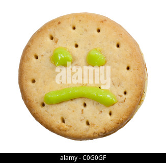 Sad face cracker Stock Photo - Alamy