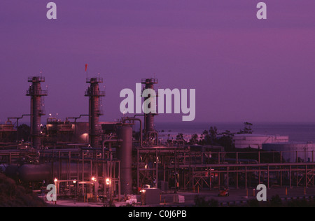 Onshore oil and gas processing plant showing storage tanks pipework ...
