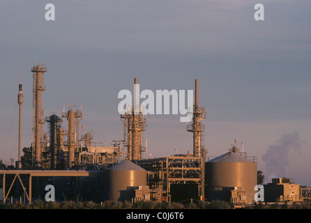 Onshore oil and gas processing plant showing storage tanks pipework ...