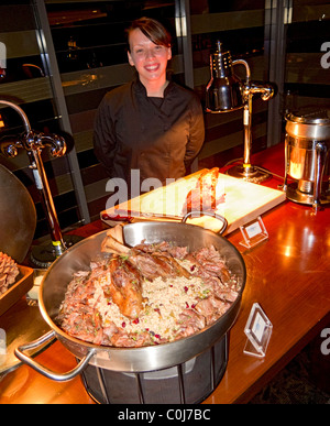 Parallax chef with her Moroccan style braised lamb shank during dinner ...