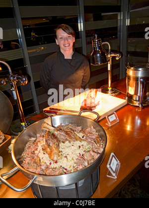 Parallax chef with her Moroccan style braised lamb shank during dinner ...