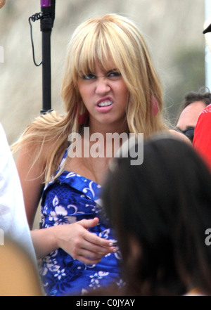 Miley Cyrus filming a scene for her television show 'Hannah Montana' in ...
