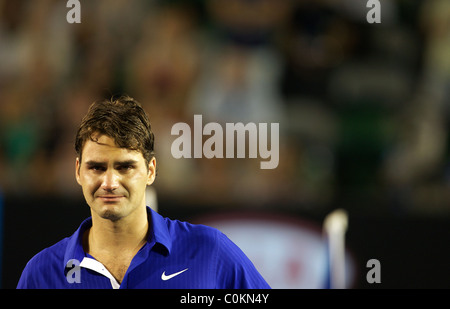 Roger Federer breaks down crying during the trophy presentation after ...