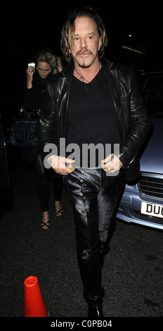 Mickey Rourke spends the night on the tiles with a mystery blonde. The ...