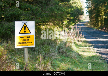 FOREST OPERATIONS WARNING SIGN IN A FOREST LOGGING OPERATION IN WALES ...