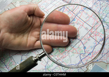 A Magnifying Glass Over A Road Map Of London, England Stock Photo - Alamy