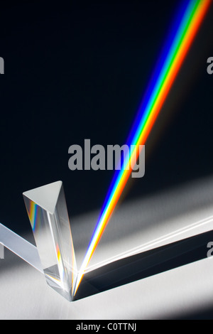 Light spectrum reflected through glass prism. Crystal prism with light ...